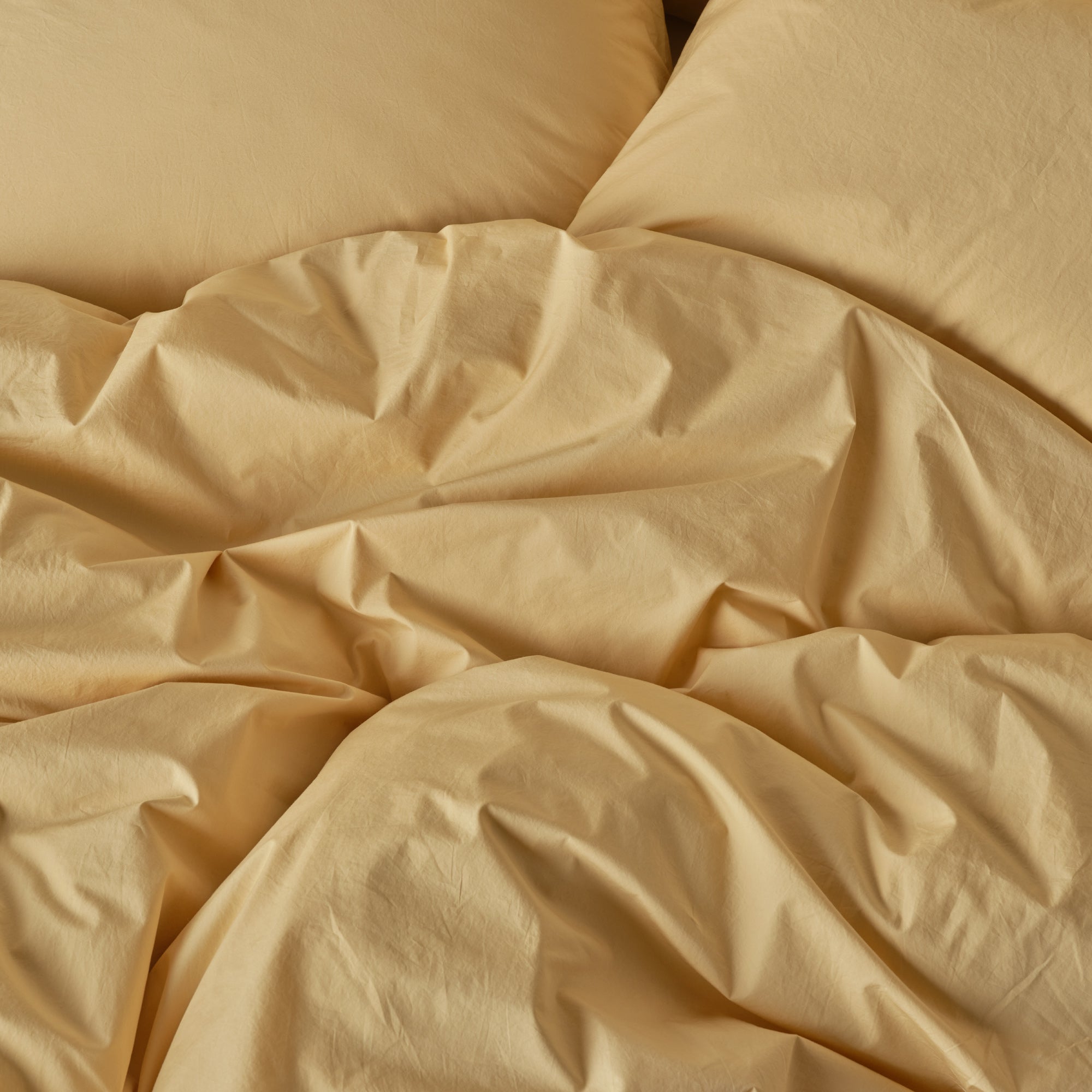 Relaxed Cotton Duvet Cover in Honey by Bedfolk